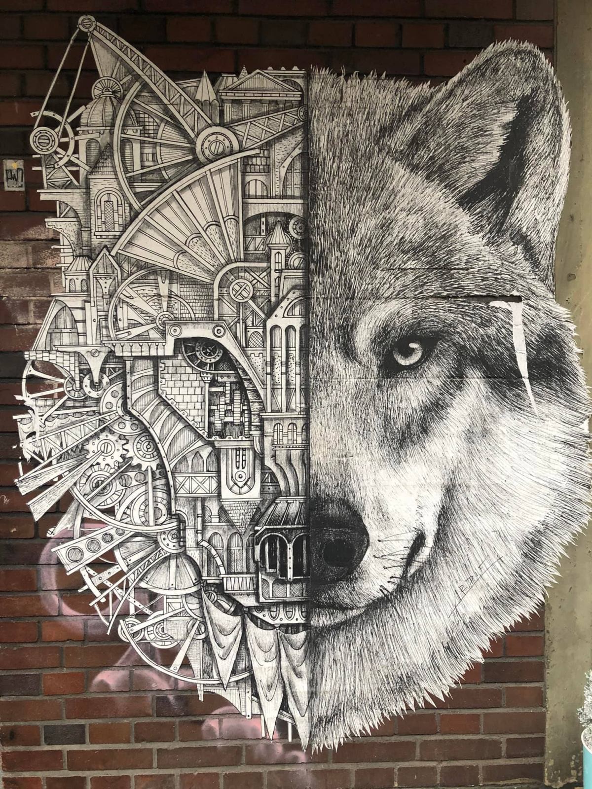 All in all its just another brick in the wolf | STREET ART UTOPIA