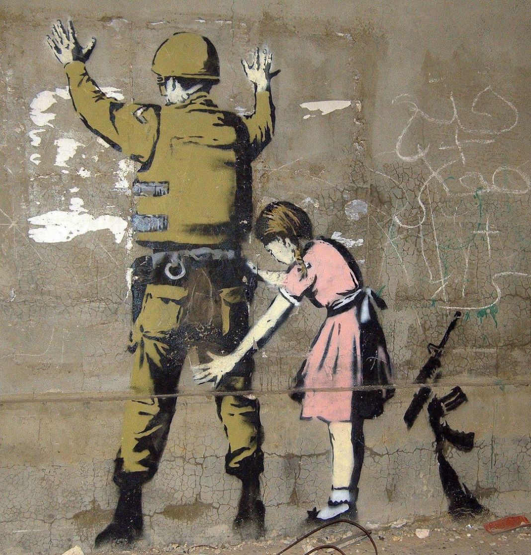 Girl Frisking Soldier – Banksy in Bethlehem | STREET ART UTOPIA