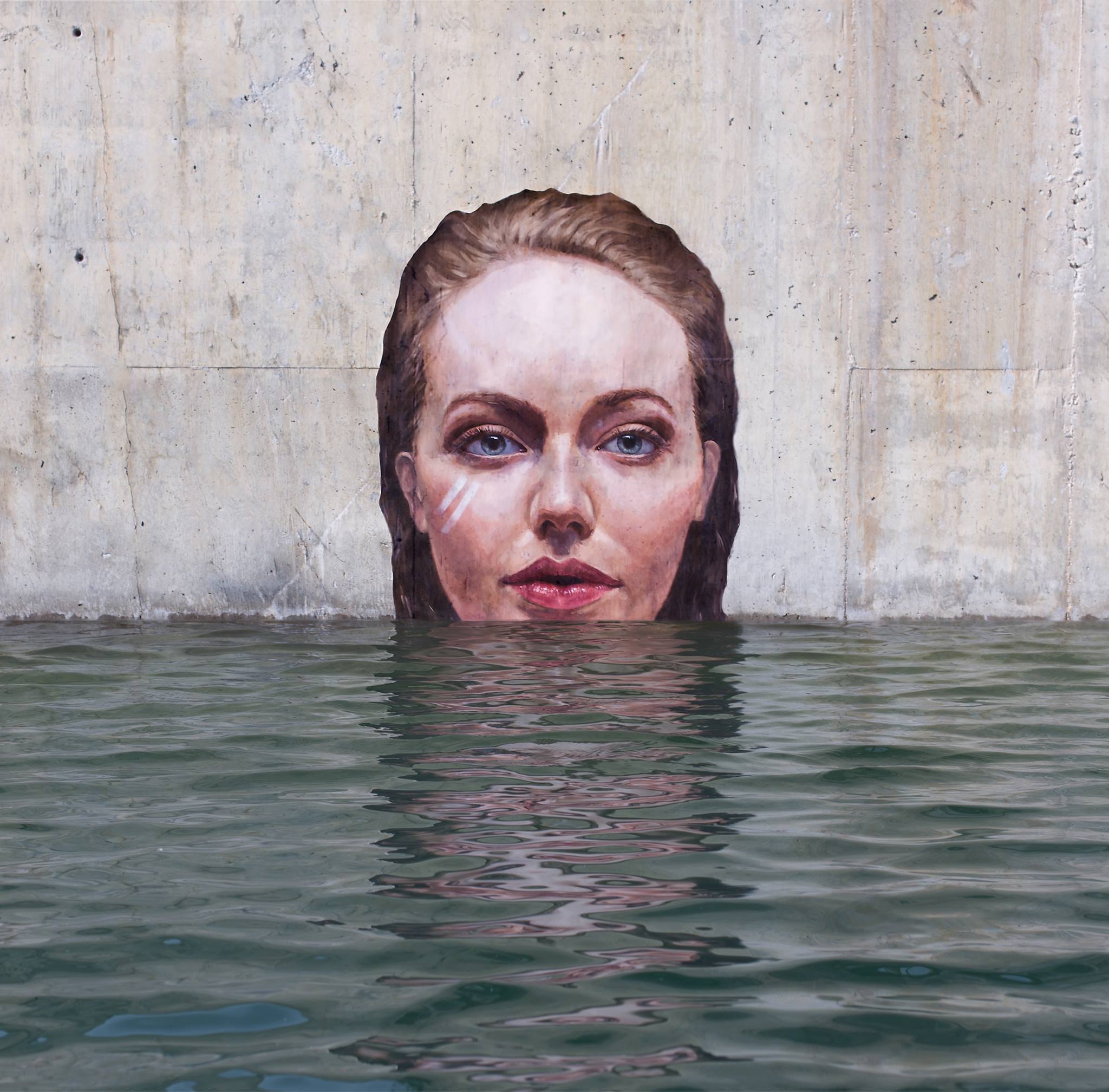 HULA Paints Stunning Seaside Murals Standing On His Surfboard At ...