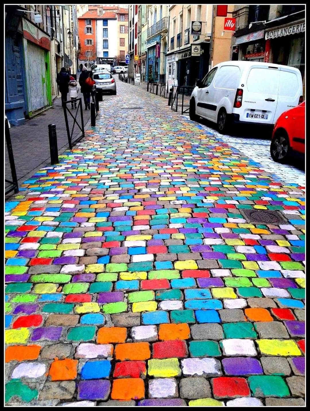 Painted cobble stones bringing colours to French village of Le Puy en ...