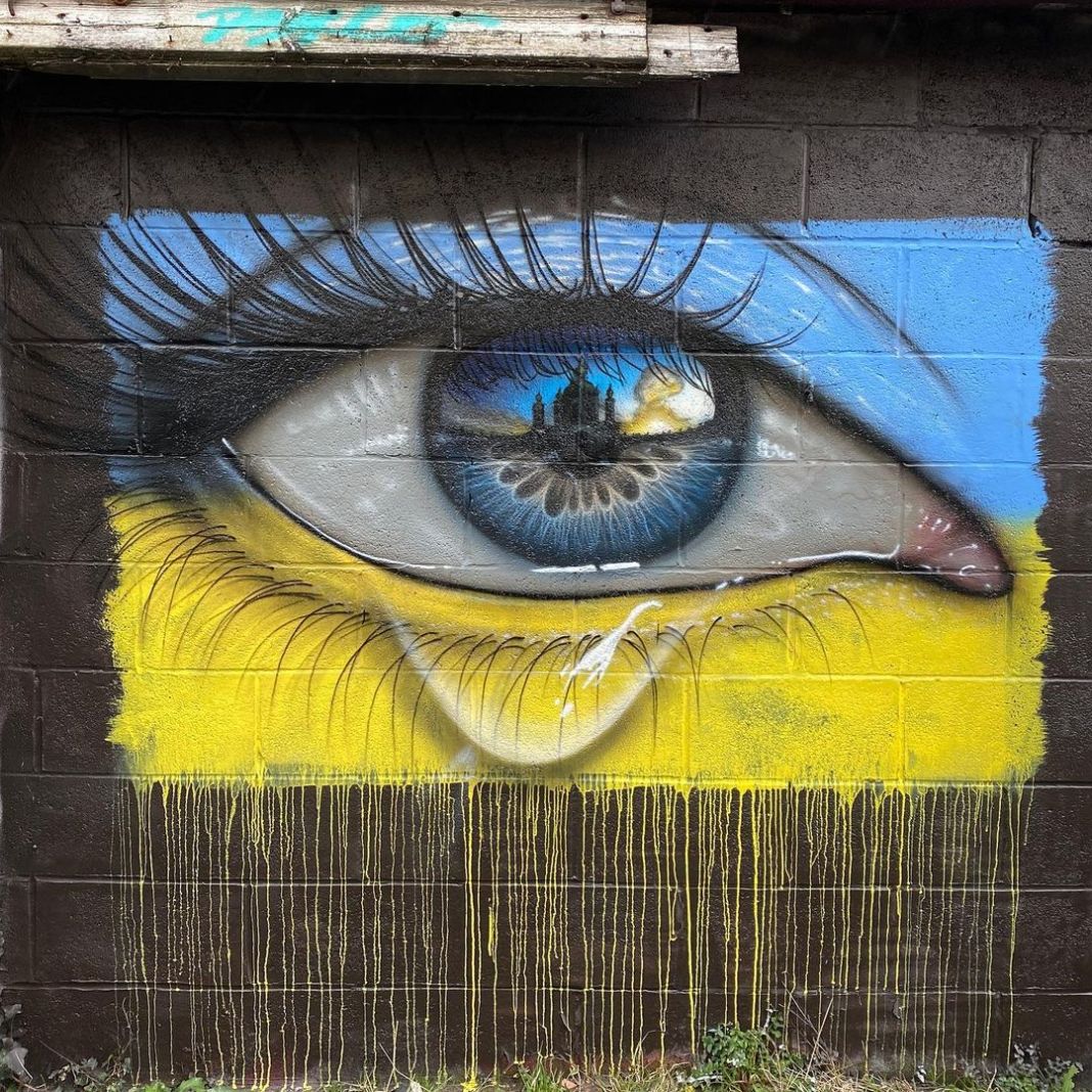 Beautiful artwork of a crying eye featuring Ukraine’s flag and bombing ...