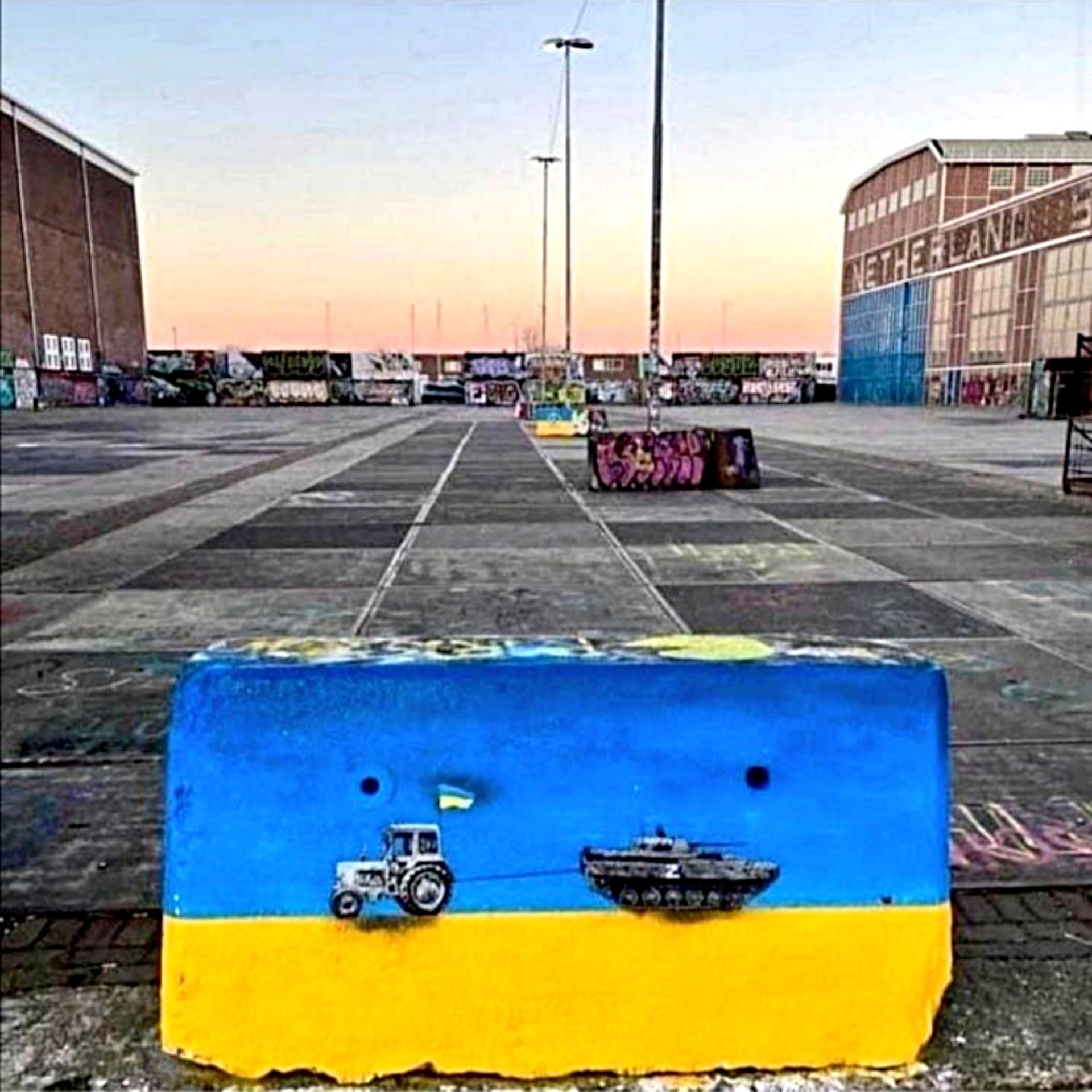 Street Art of Tractor pulling a tank in Putins war on Ukraine | STREET ...