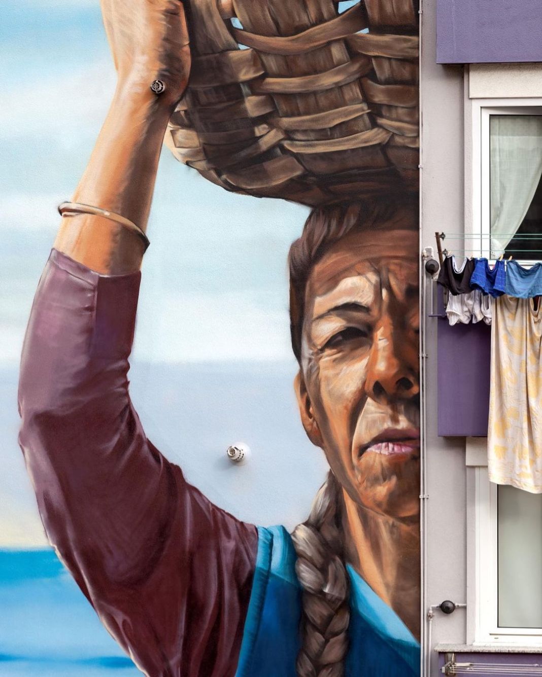 Mural by Muraleslian in Mutriku, Spain. | STREET ART UTOPIA
