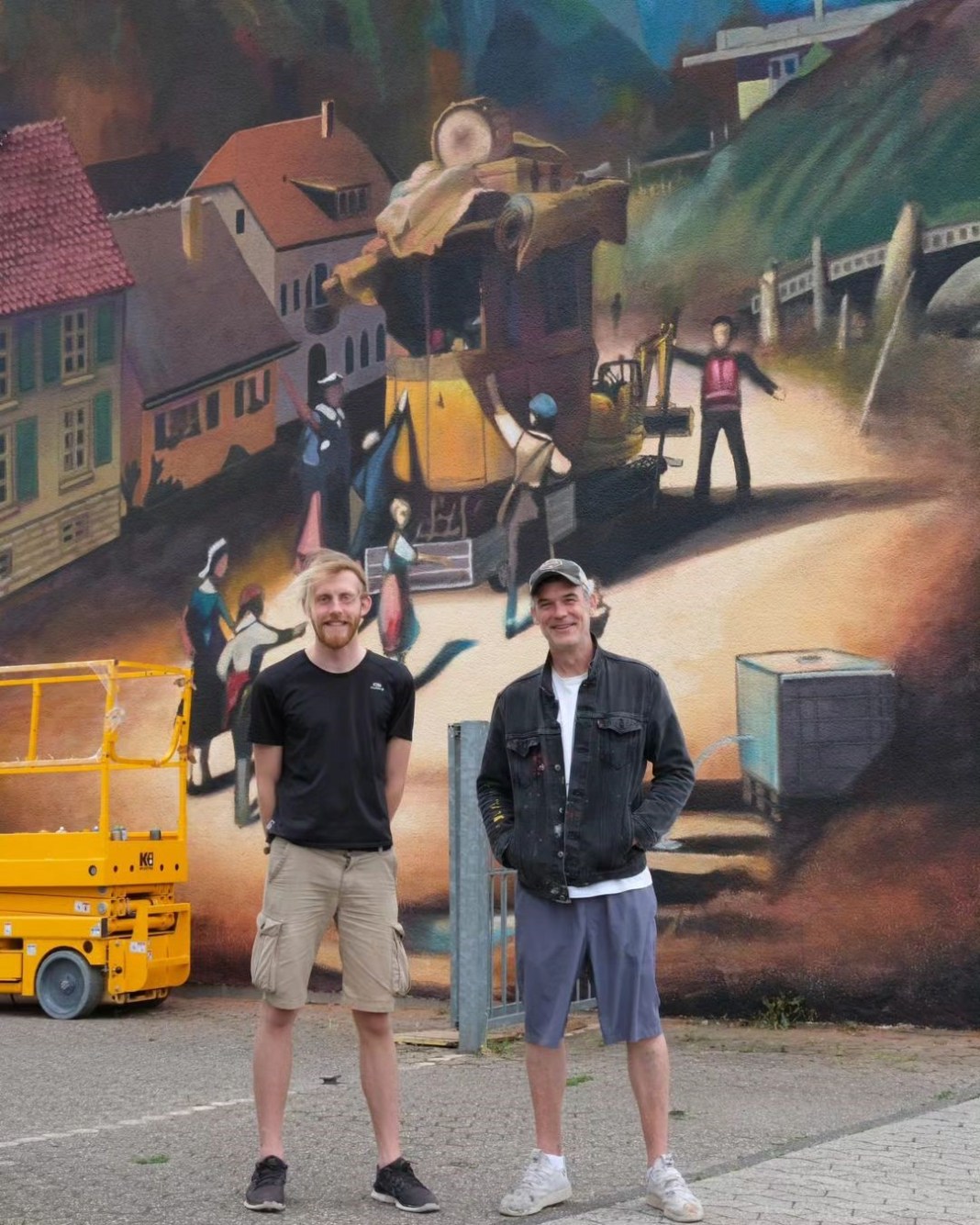 4 photos of the mural “Solidarity, Helpfulness, Community” by Lukas ...
