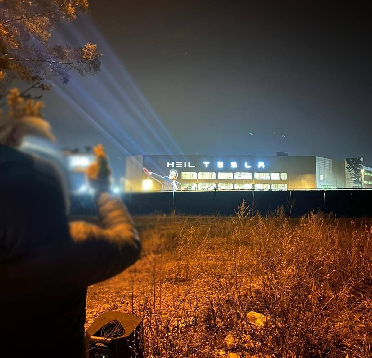 Why Led By Donkeys Targeted Elon Musk with projection on Tesla Factory ...